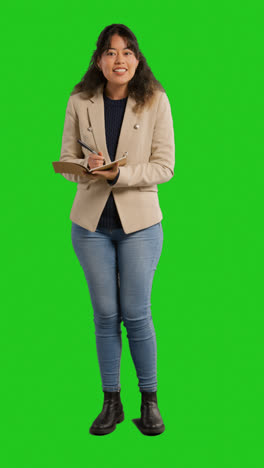 Vertical Video Of Female Teacher In School Classroom Standing Taking ...