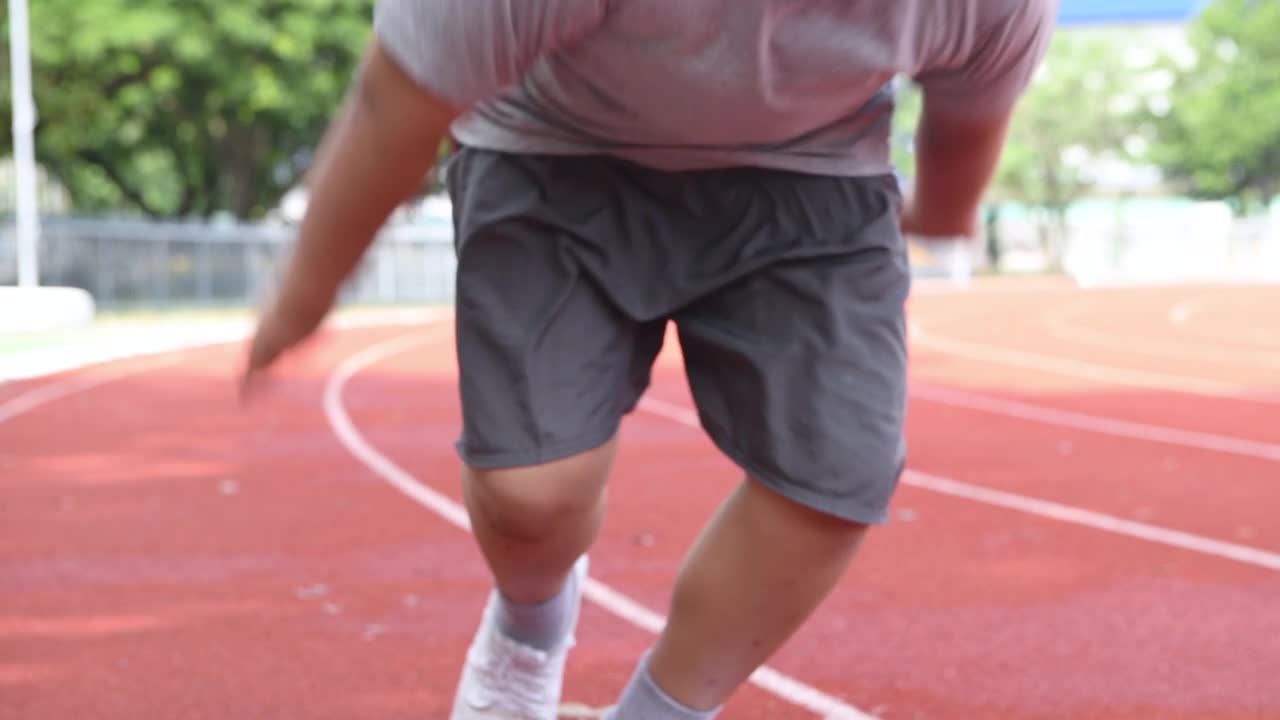 Fit And Confident Fat Boy In Starting Position Ready For Running. Kid ...