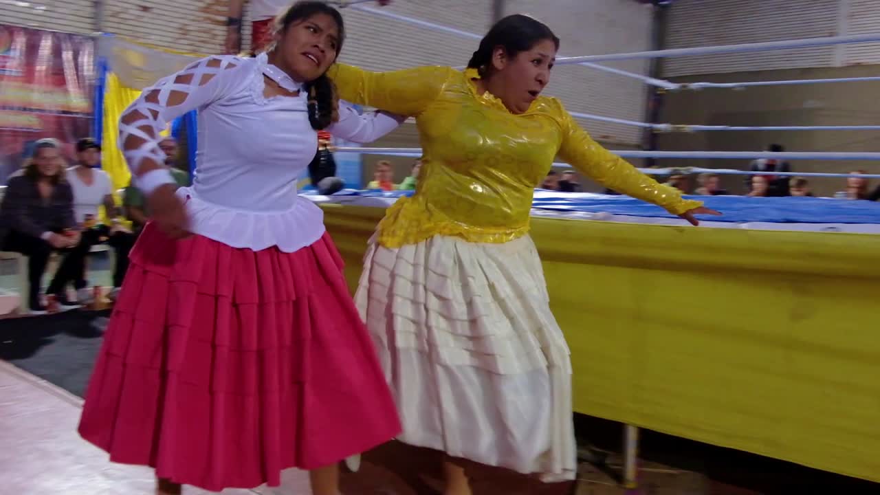 Female Woman Cholita Wrestlers In Native Costume Fight In A Boxing Ring ...