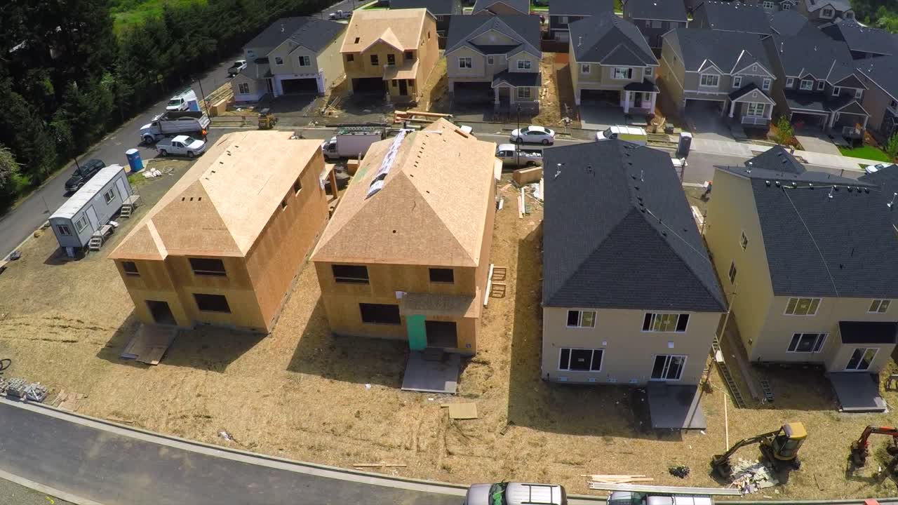 An Aerial Image Over Houses Under Construction In A Subdivision Free ...