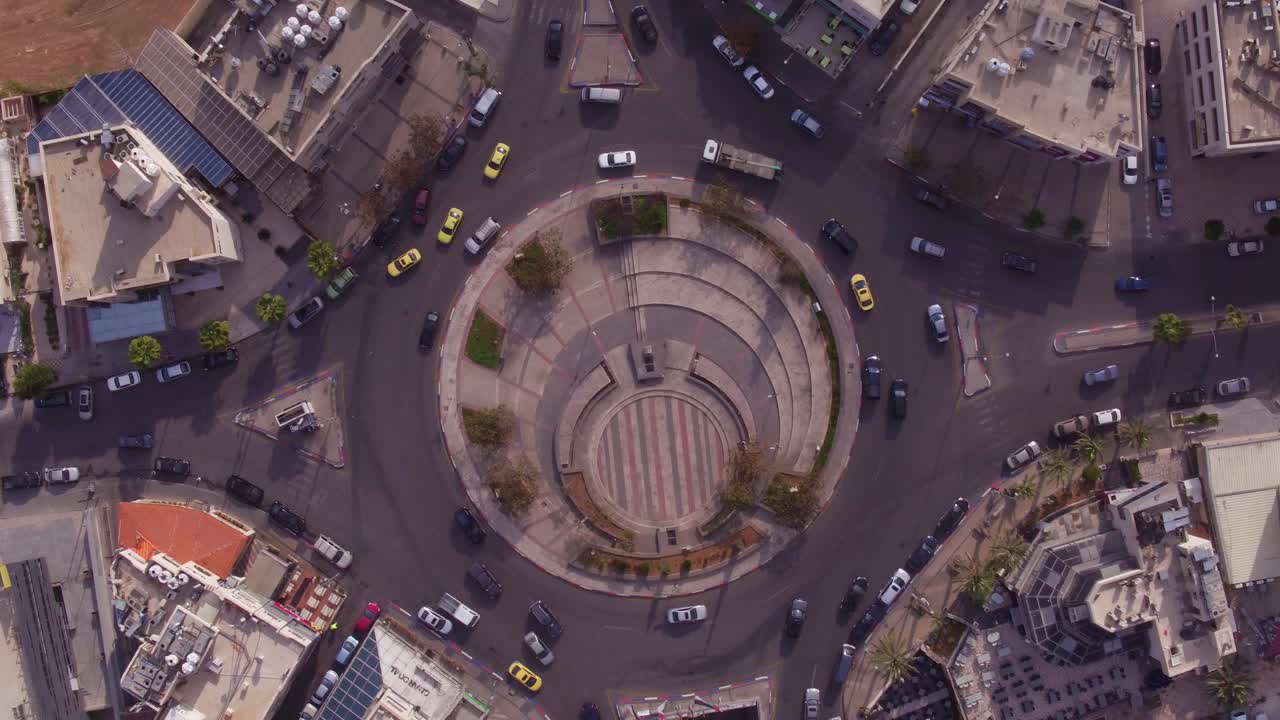 Aerial Straight Down Of Traffic Circle Or Roundabout With Car Traffic ...