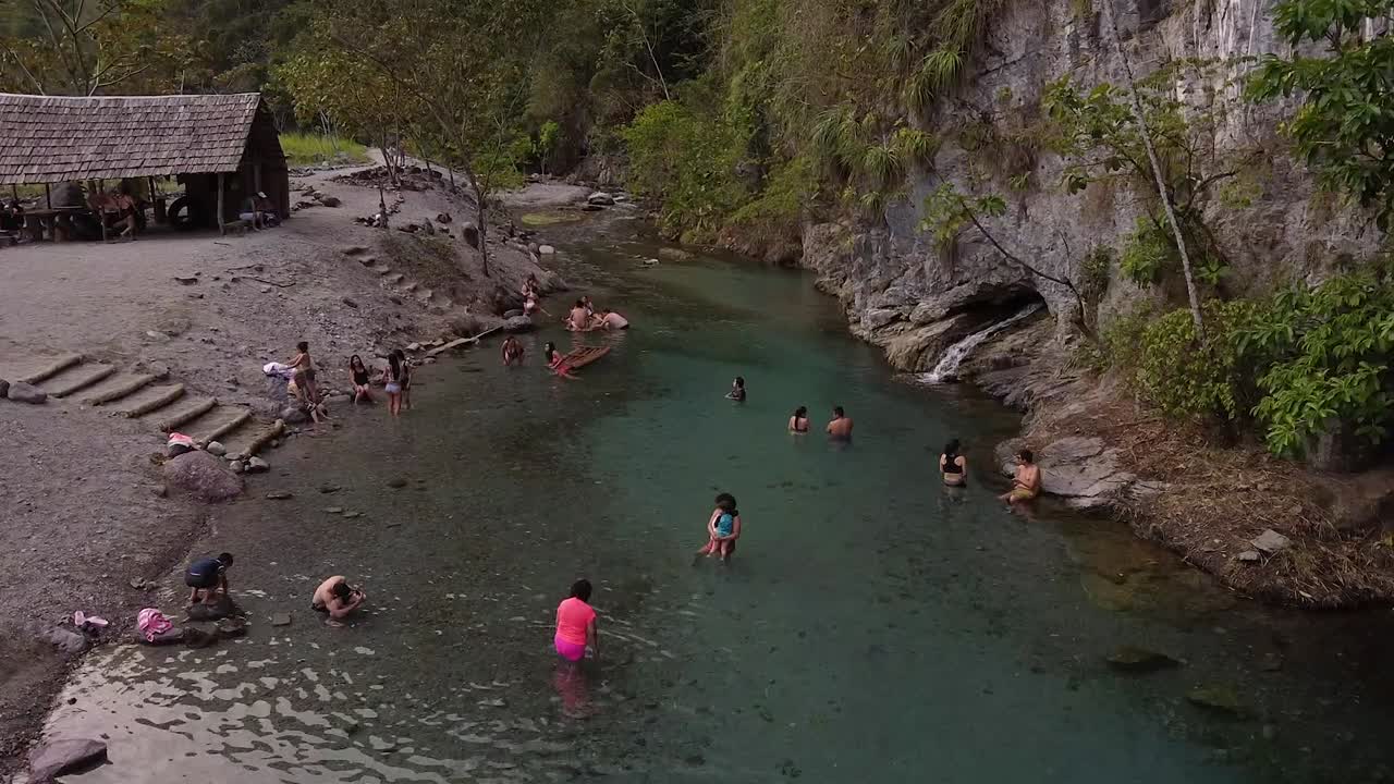 Tourists Swimming, Relaxing And Enjoying In Pozuzo Turquoise Natural ...