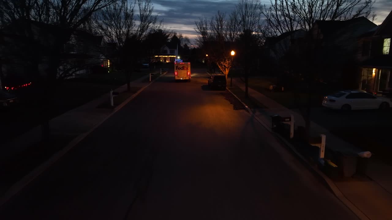 FedEx Truck Makes Package Deliveries In Residential Home Community At ...