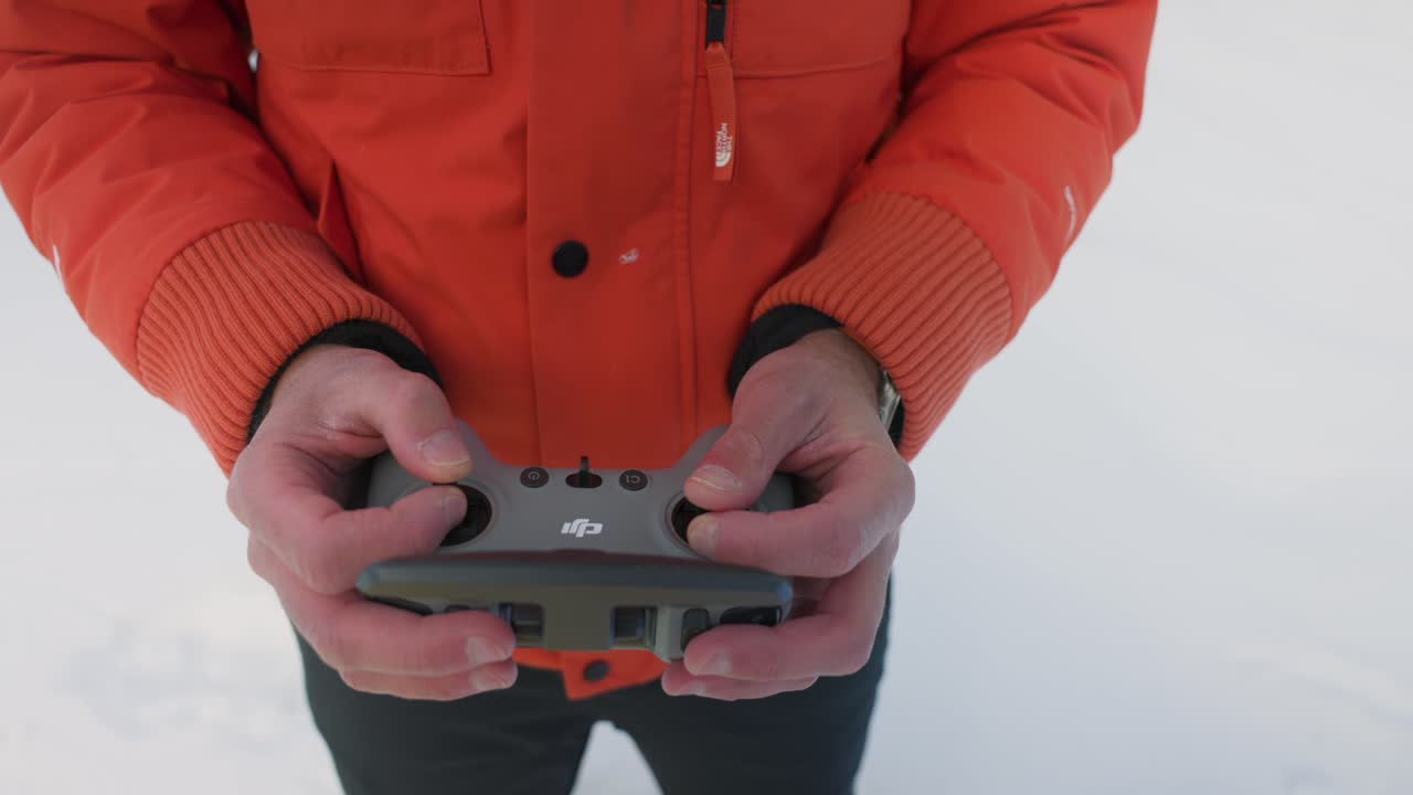 Drone Pilot With FPV Viewer Controlling DJI Avata Quadcopter With ...