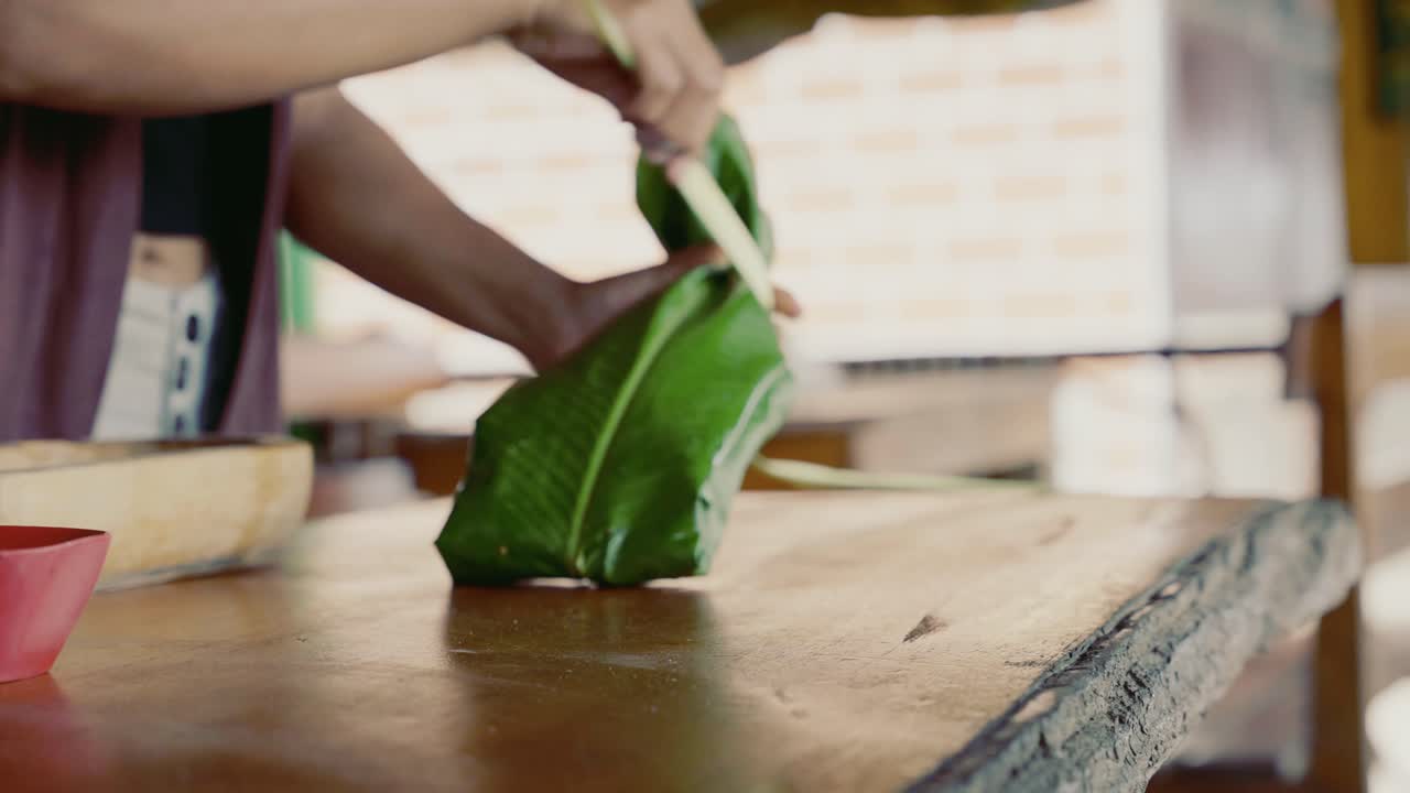 Tying Maito Amazon Food In The Jungle Free Stock Video Footage Download ...