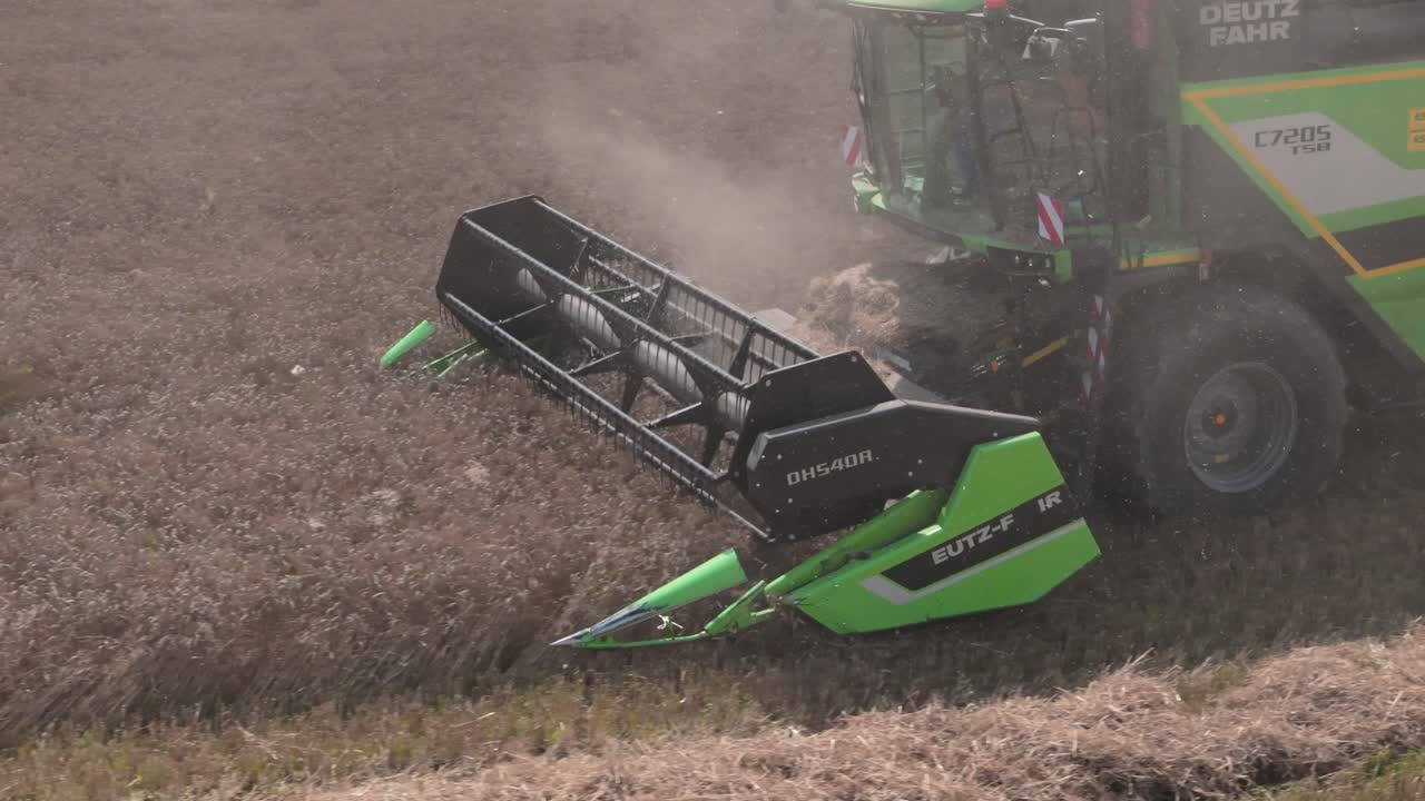 Modern Farming Equipment Reaping, Threshing And Gathering Crops From ...