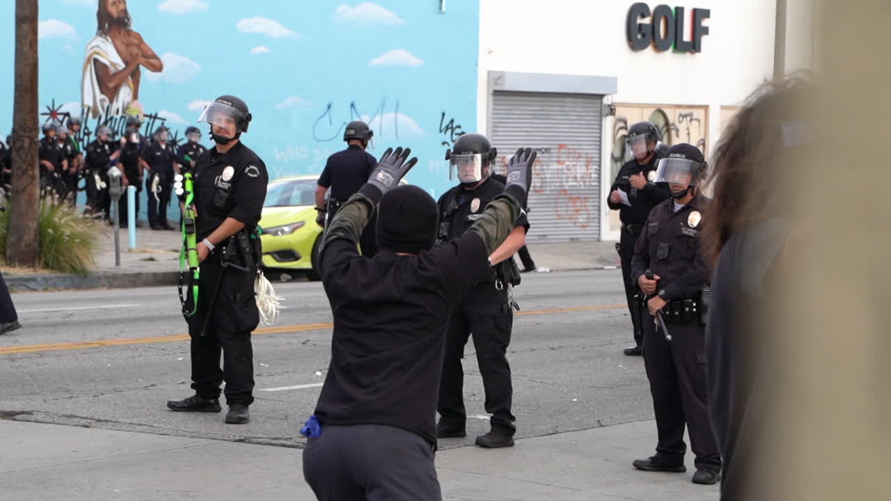 Man With Raised Hands In Front Of Police Blockade In Los Angeles ...