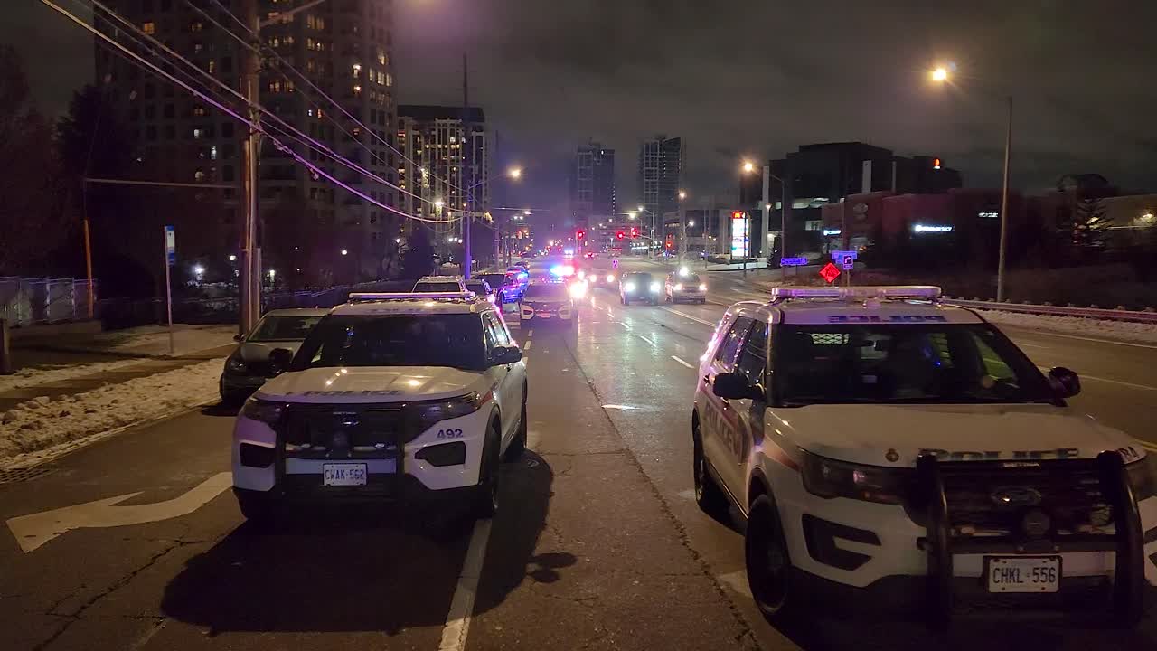 Convoy Of Cop Cars Lined Up Outside Murderous Crime Scene Free Stock ...