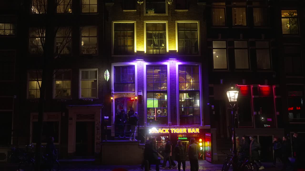 Static Shot Of The Black Tiger Bar In Amsterdam During Nighttime ...