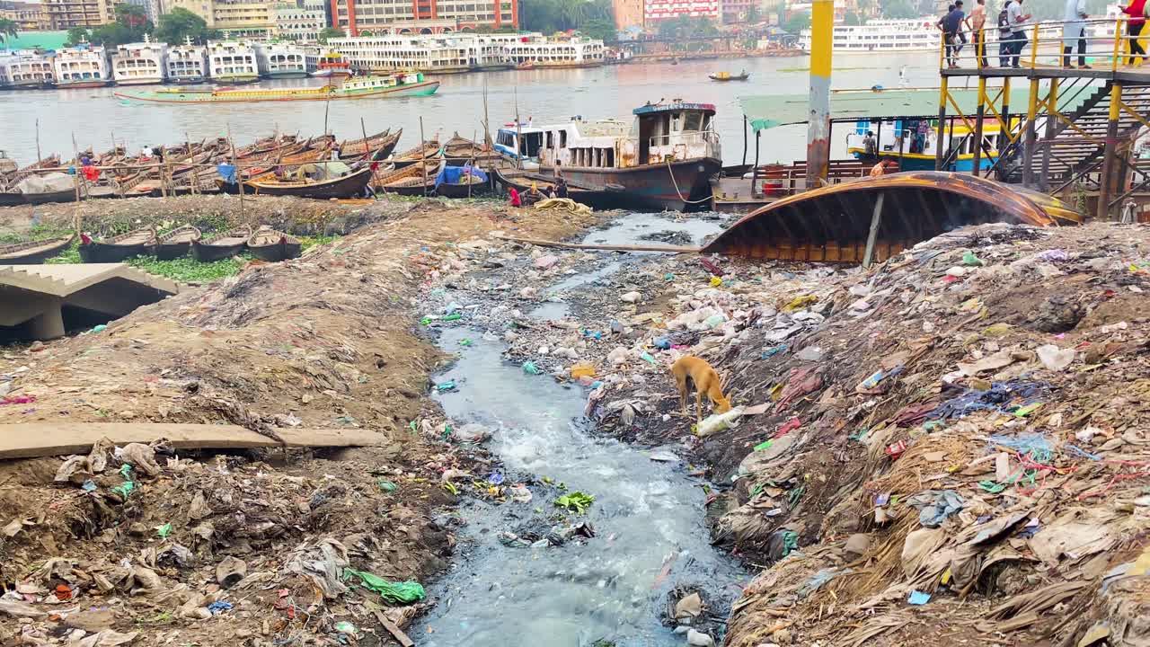 Sewage Pollution In The River, Garbage On The Riverside With Fishing ...