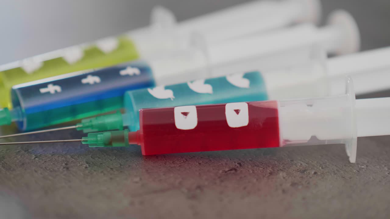 Several Syringes Filled With Colorful Liquid Symbolizing Social Media ...