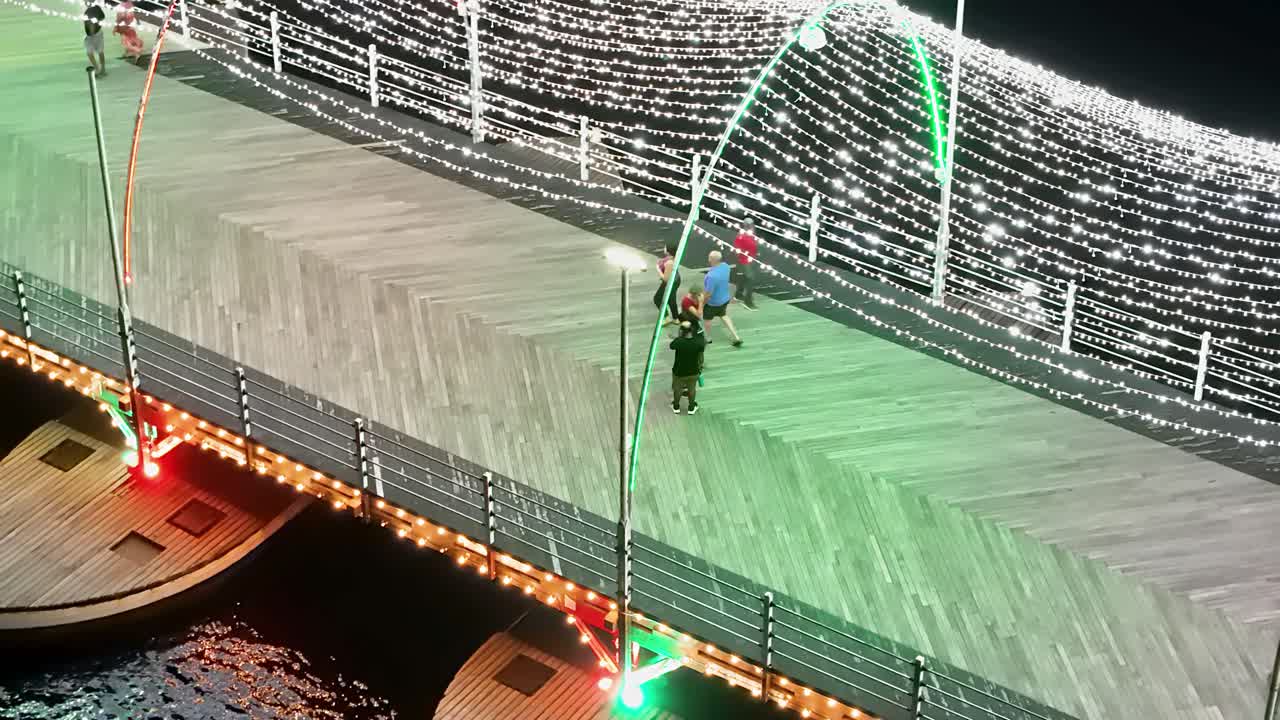 People Walk And Cross Gorgeous Pontoon Bridge At Night In Curacao Free ...