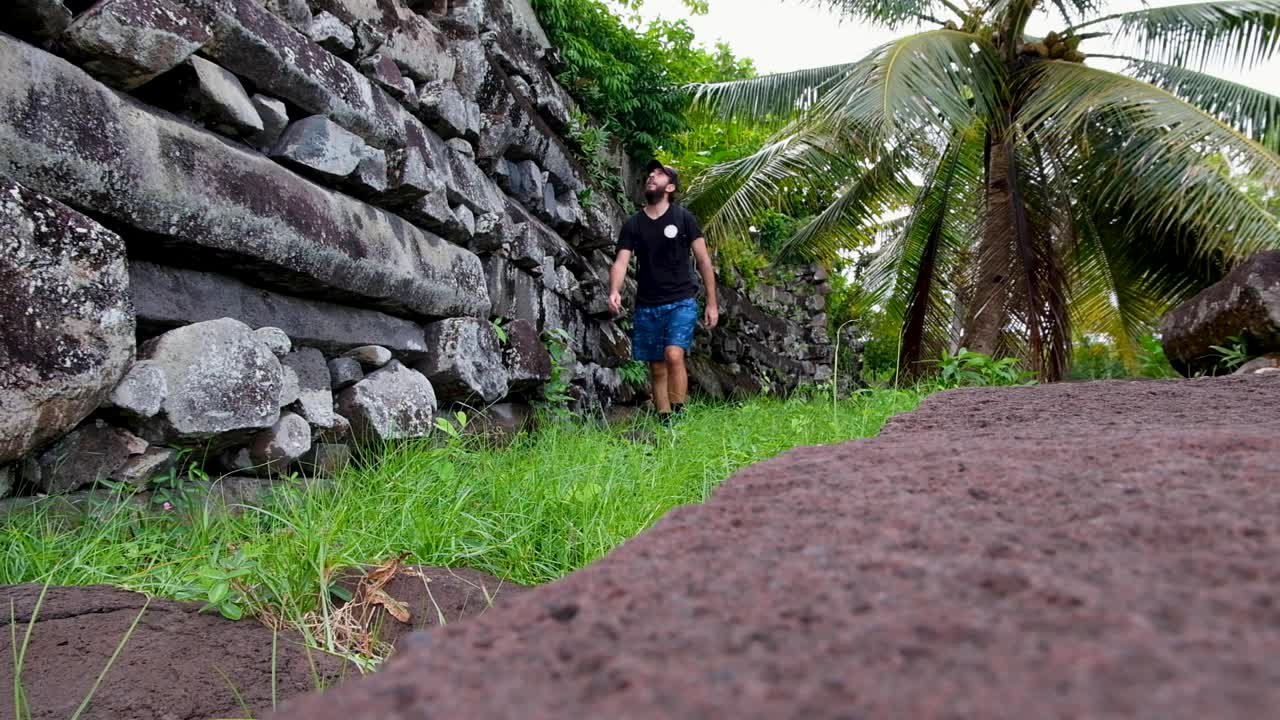 Tourist Visiting The Ancient Cit Of Nan Madol And Walking Around The ...