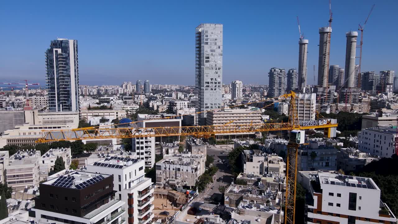 Yellow High Crane Working On Building Construction On David Bloch ...