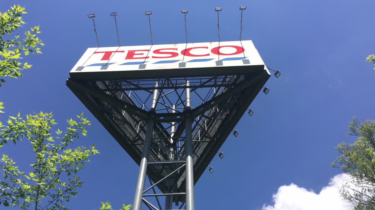 Large Advertisment Banner Tower Of Tesco Department Store With Spring ...