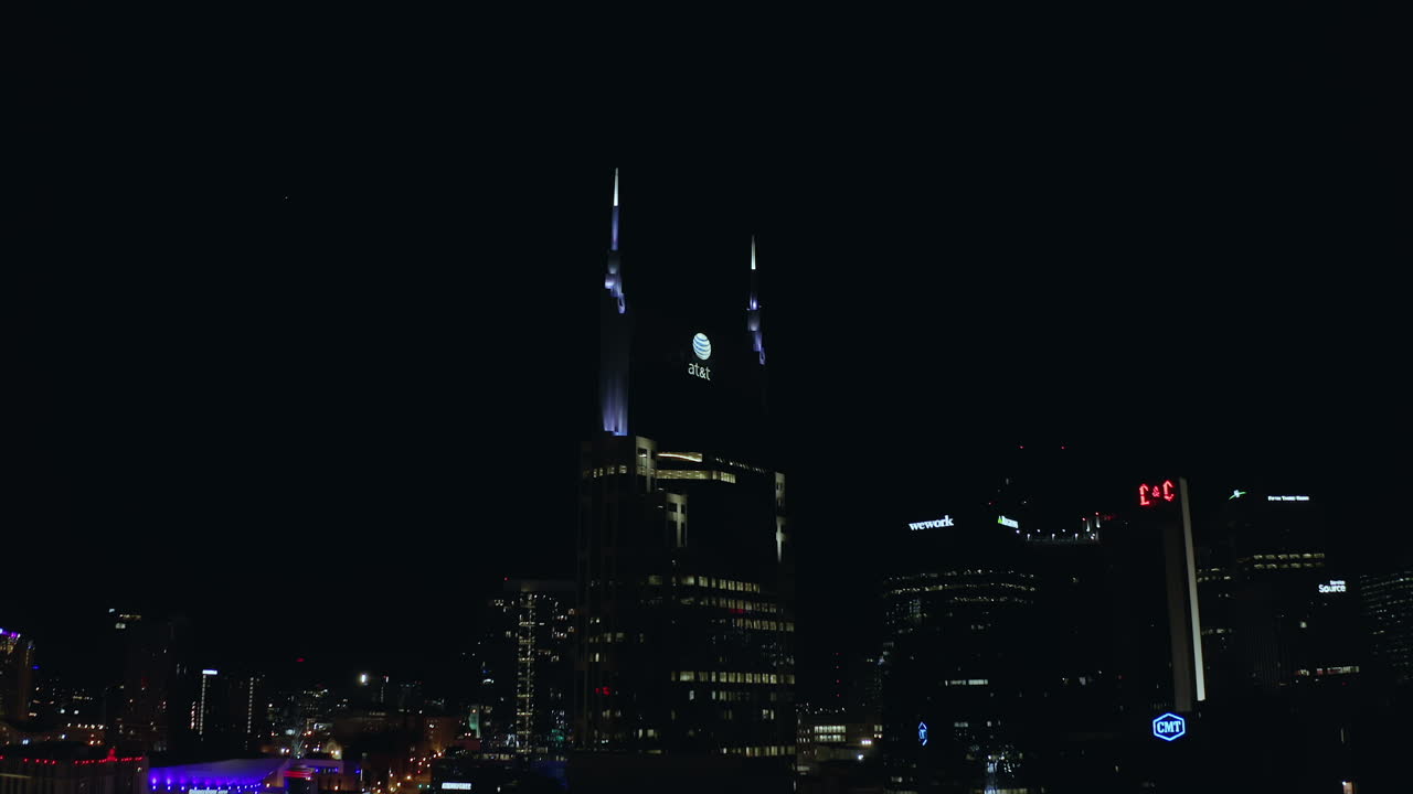 Orbiting Aerial Of Dark ATT Batman High Rise Building In Nashville TN ...
