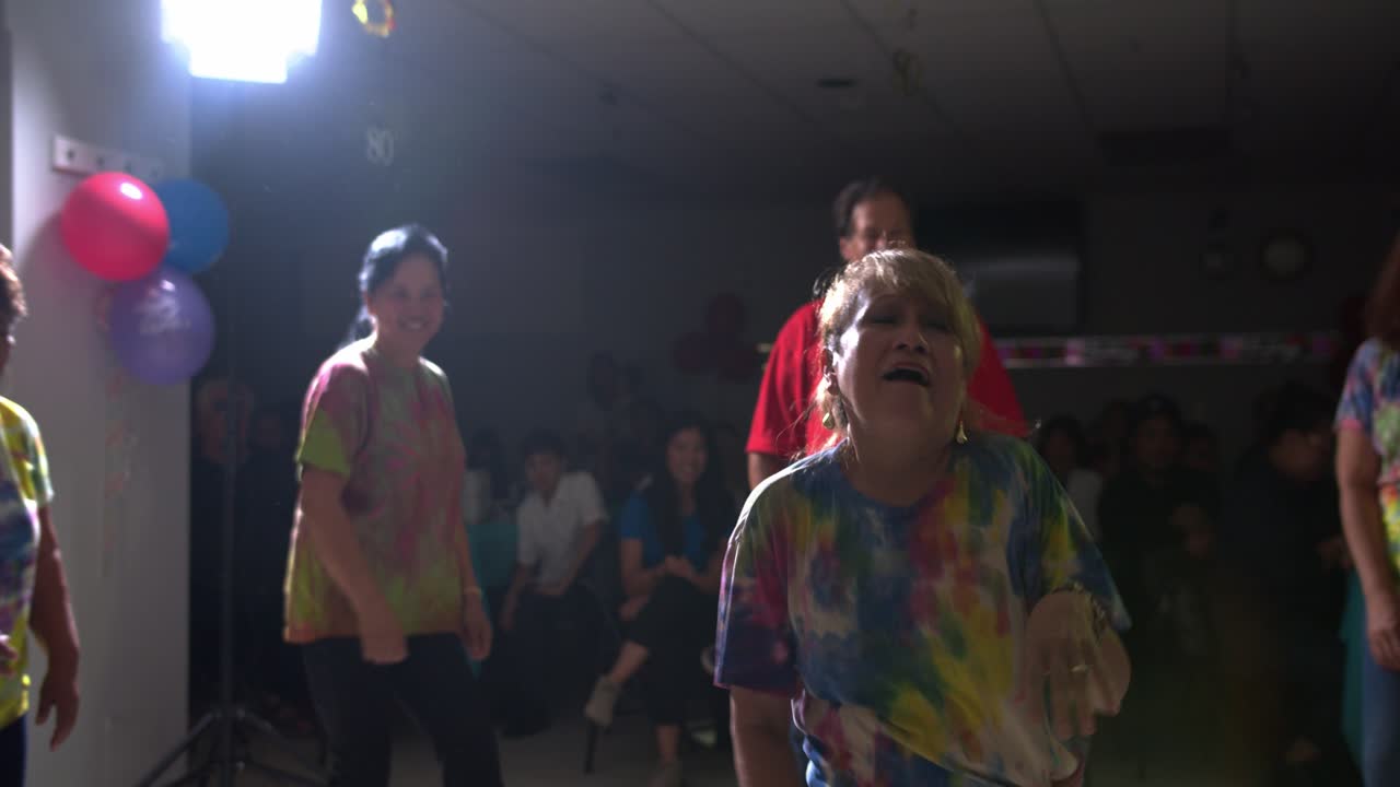Adult Filipino And Asian People Doing Dance Solos At A Party Gathering ...