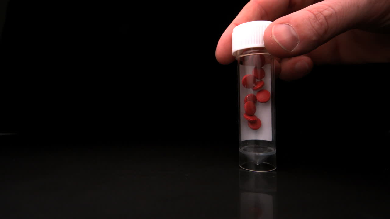 Hand Shaking Plastic Jar Of Medicine Free Stock Video Footage Download ...