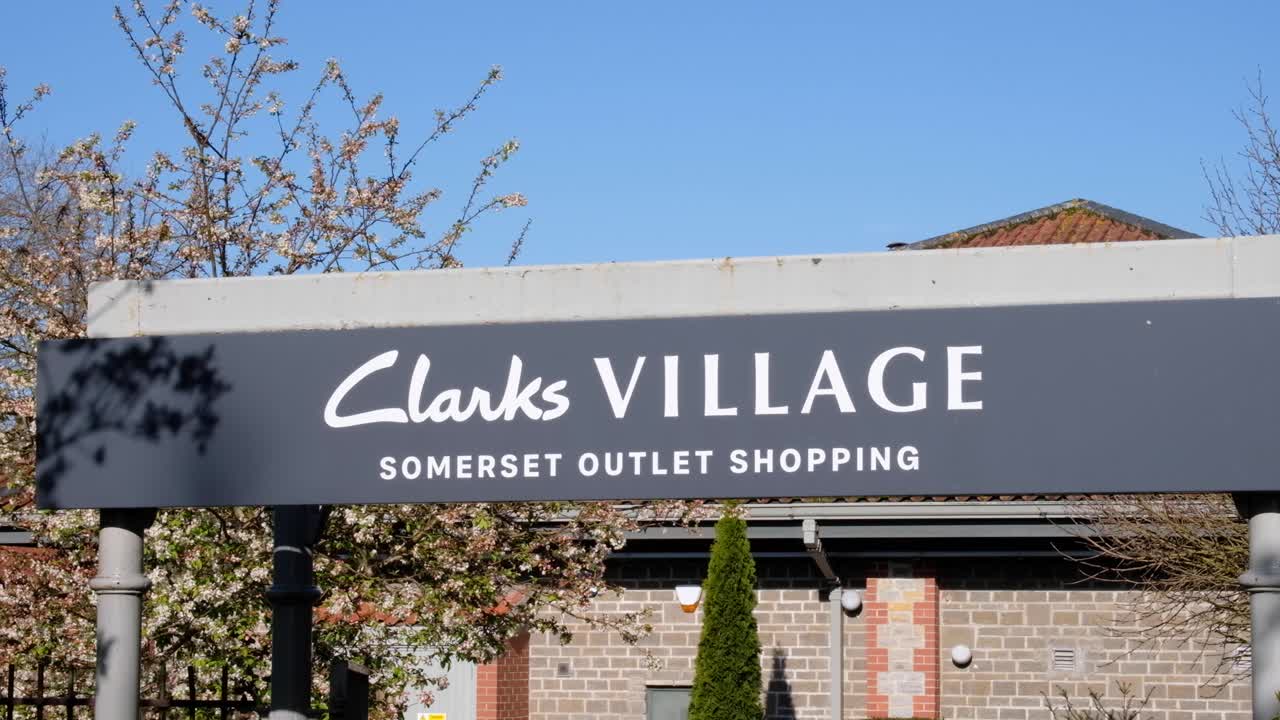 Close Up Of Entrance Sign To Clarks Village Somerset Outlet Shopping ...