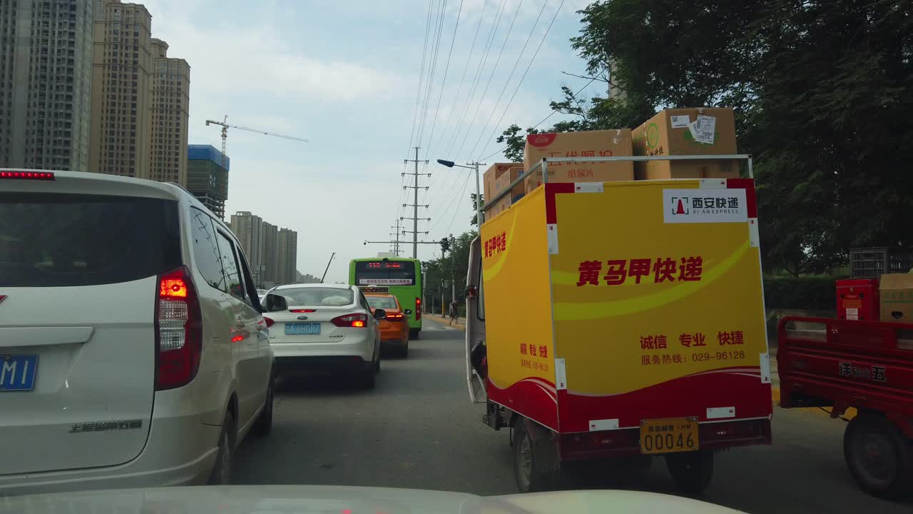 Xian, China - July 2019 : Car Front View Of The Traffic On Busy Street ...