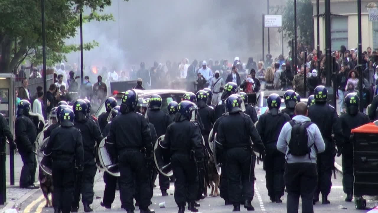 Riot Police Retreat As People Throw Missiles At Them And Vehicles Burn ...