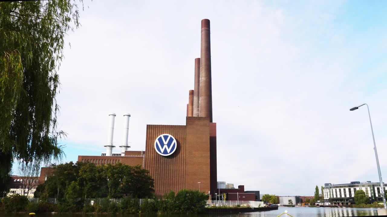 View Looking At VW Logo On Side Of Volkswagen Factory Building With ...