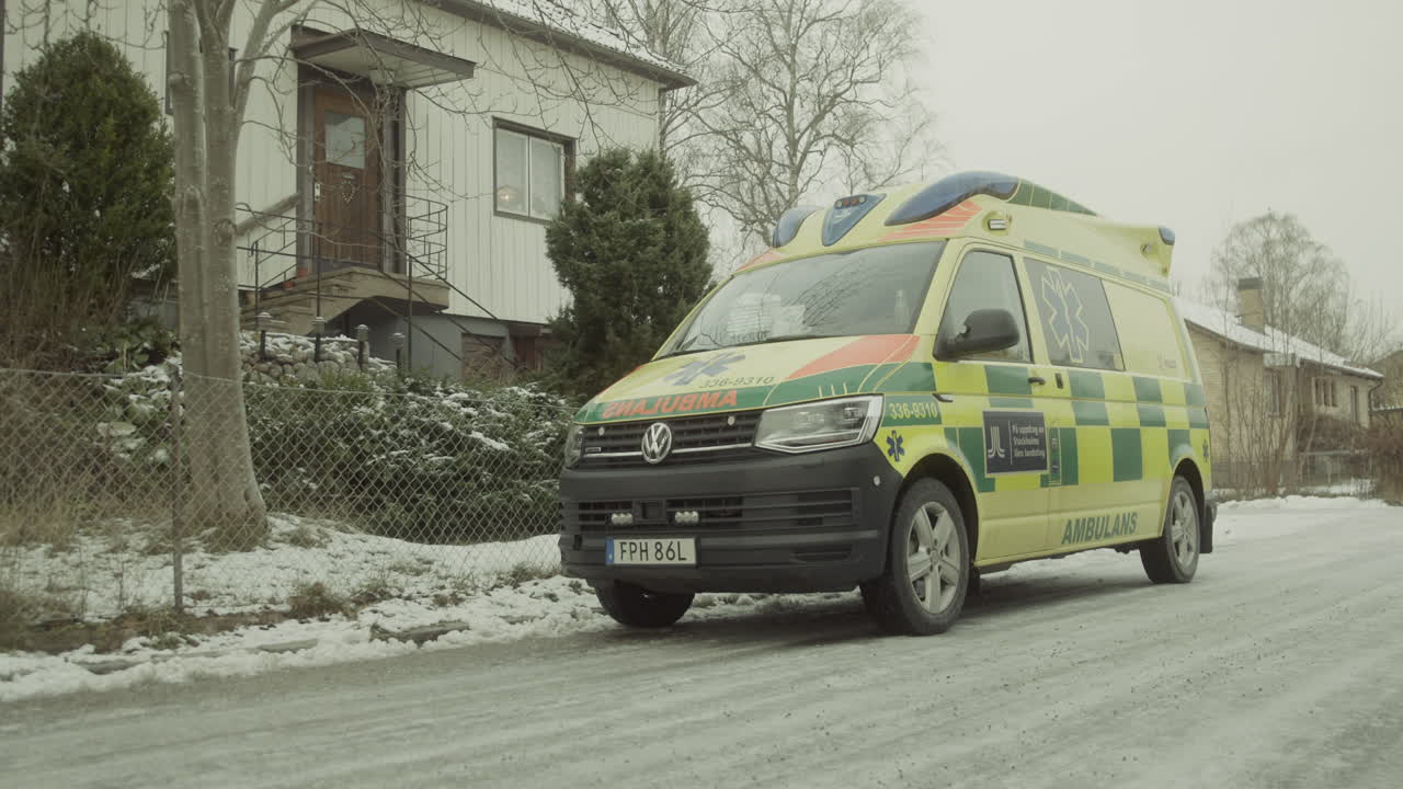 Swedish Emergency Ambulance Vehicle In Stockholm Villa Suburbs Handheld ...