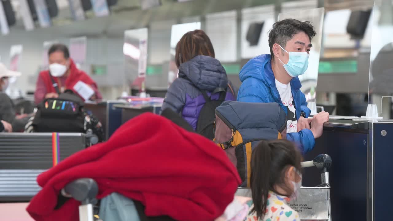 Travel Flight Passengers Queue In Line To Check In At The Air China ...