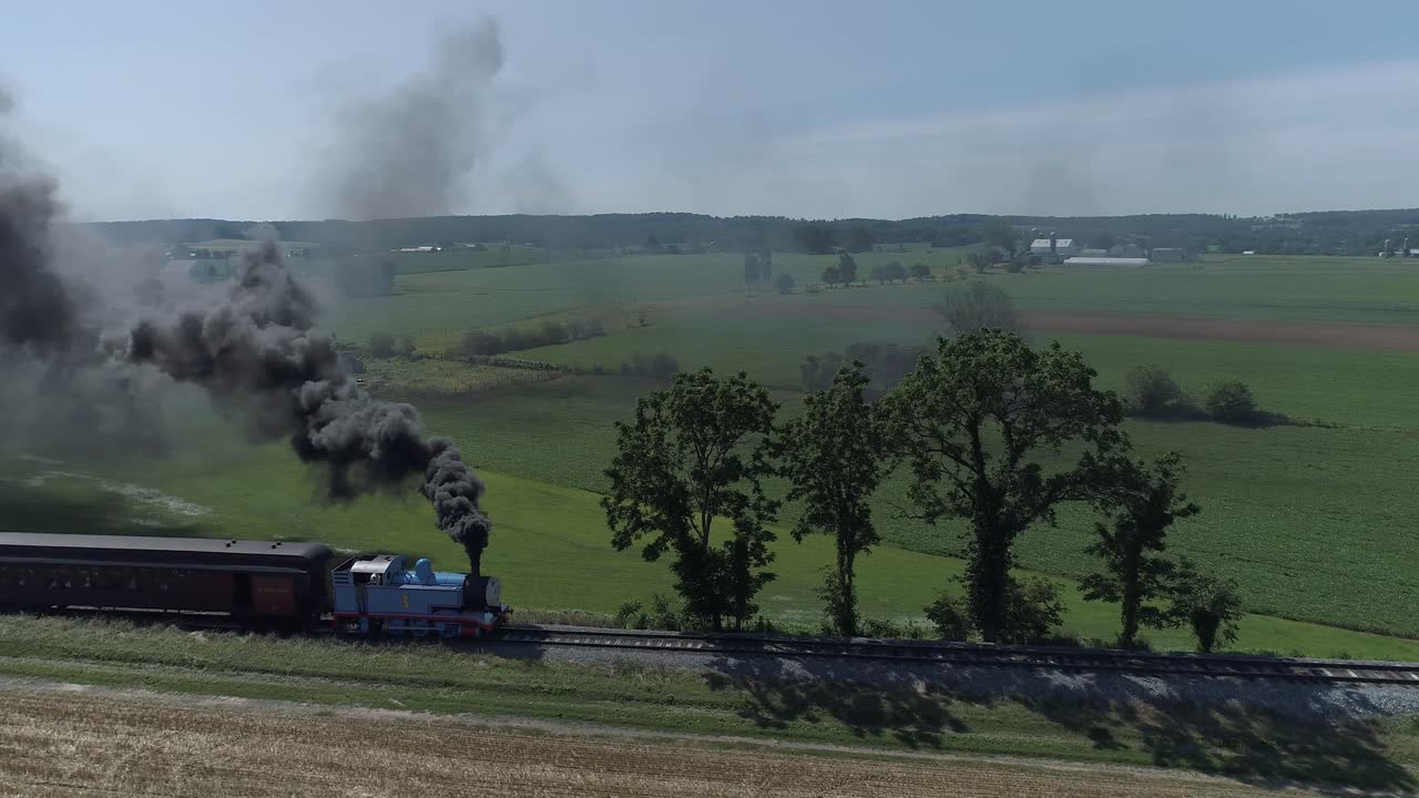 Aerial View Of A Thomas The Tank Engine With Passenger Cars Puffing ...