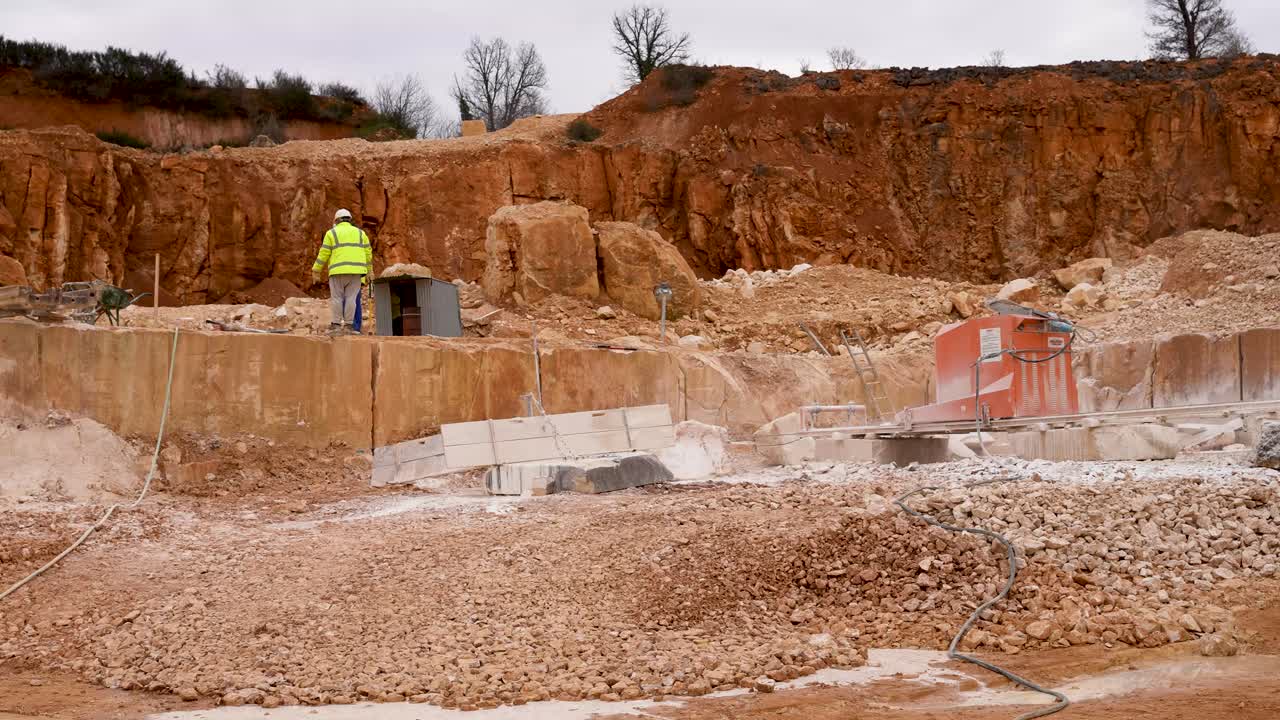 Limestone Quarry Mine With Cut Blocks Being Inspected By Crew, Pan ...