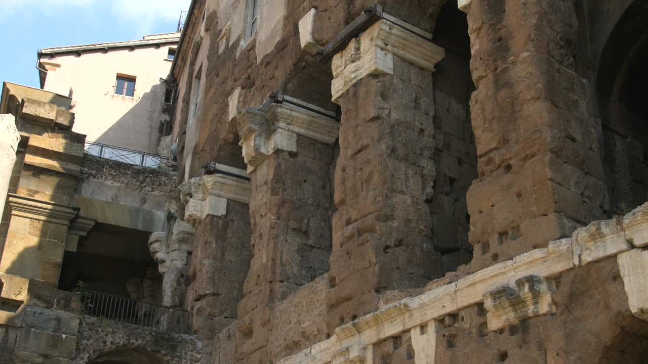 Tilt Up Shot Of Theater Of Marcellus Amphitheatre Building In Rome ...
