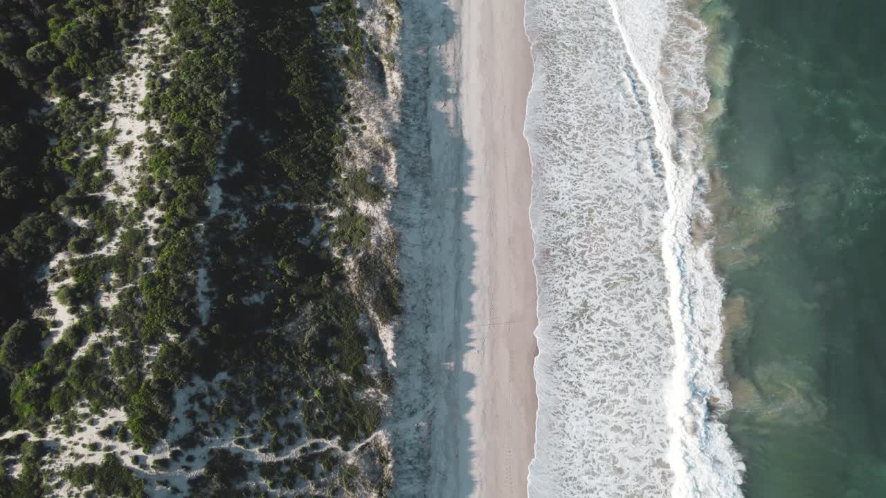 Drone Shot Panning Up From Magenta Beach To Reveal The Horizon As The ...