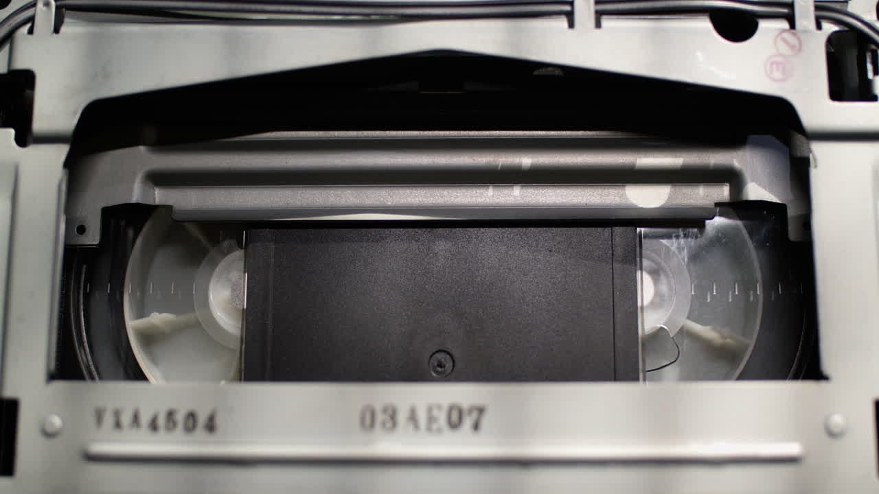Close Up Shot Of A Vintage VHS Tape Recorder - Fast Forward Free Stock ...