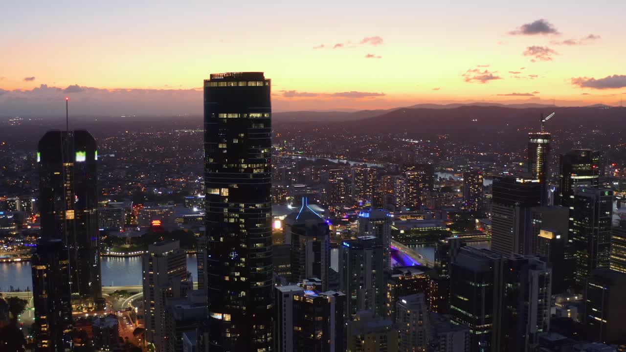 High-Rise Buildings, Brisbane River, And Wheel Of Brisbane Illuminated ...