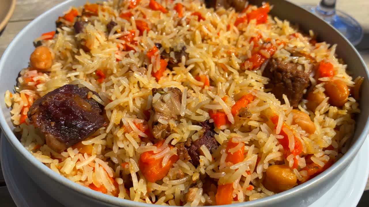 Delicious Traditional Beef Plov With Carrots, Raisins, Onion And ...