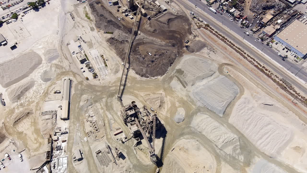 Open Pit Mining Quarry For Sand And Gravel - Aerial Tilt Up To Reveal ...