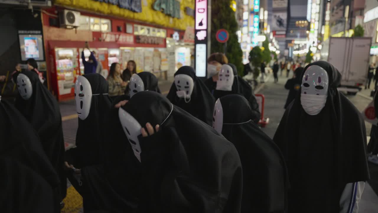 Crowd Of Halloween Goers Dressed As "No-Face" Character In Shinjuku ...