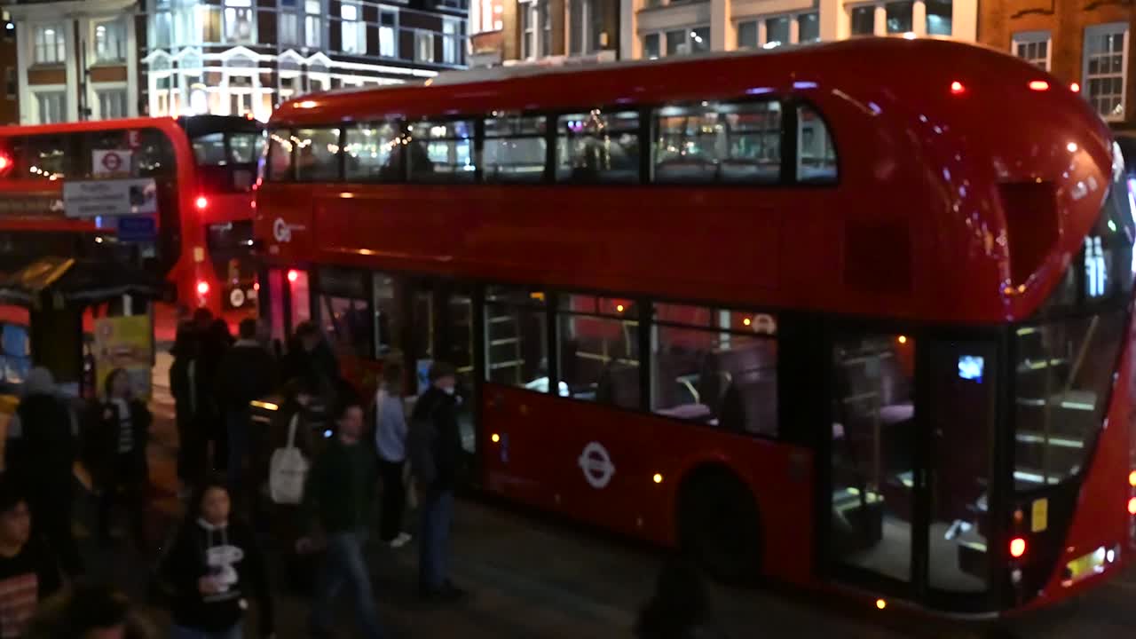 TFL Buses Driving In The Evening Along Liverpool Street, London, United ...