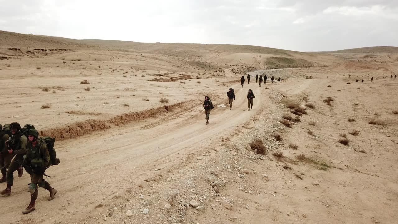 Drone Shot Of IDF Soldier Troops Walking Forward During Military ...