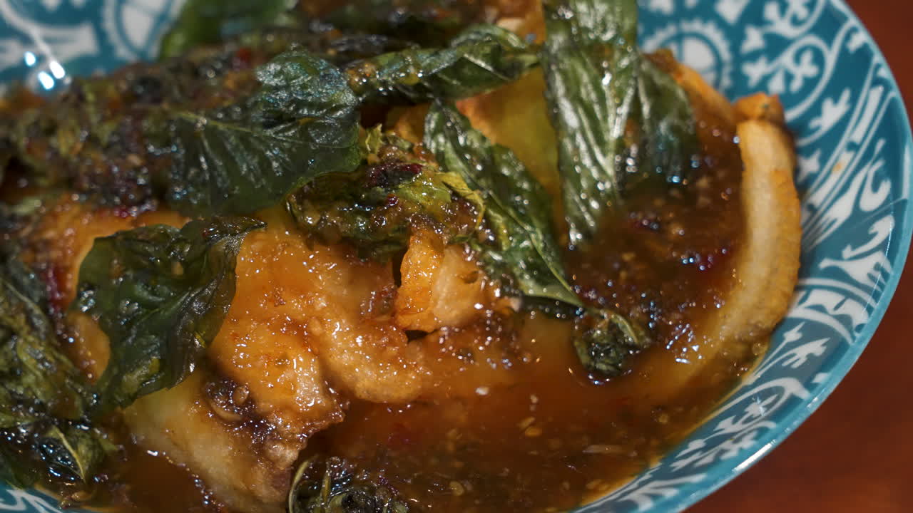 Plated Thai Dish Pla Sarm Rod, Bowl Filled With Fried Tilapia Topped ...