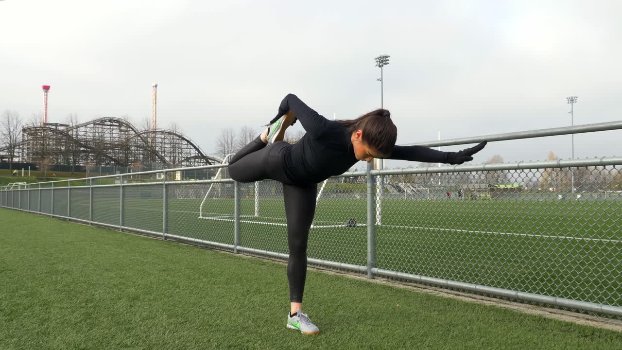 Girl Balancing On One Leg, Stretch Exercise After Rigorous Workout Free ...