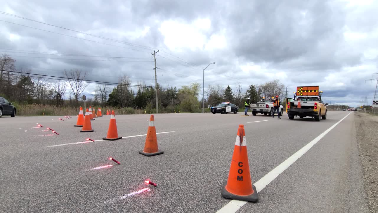 Police And Safety Workers Block Traffic On The Highway With Flares And ...
