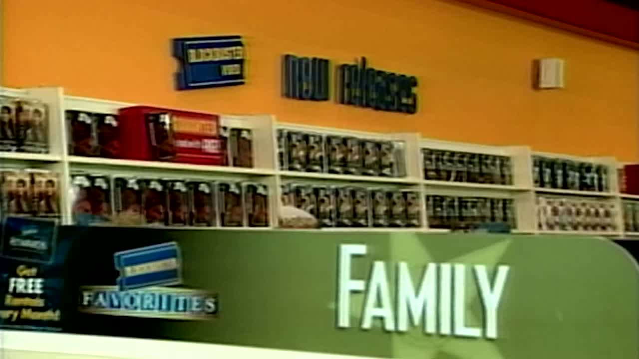 INSIDE BLOCKBUSTER VIDEO ZOOMING INTO NEW RELEASE SIGN IN 2005 Free ...