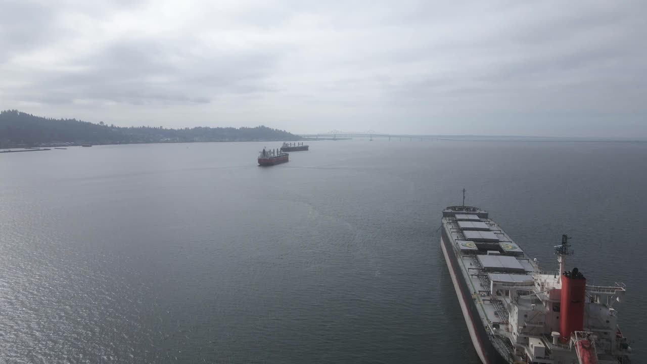 Three Ocean Going Container Ships Anchored Near The Mouth Of The ...