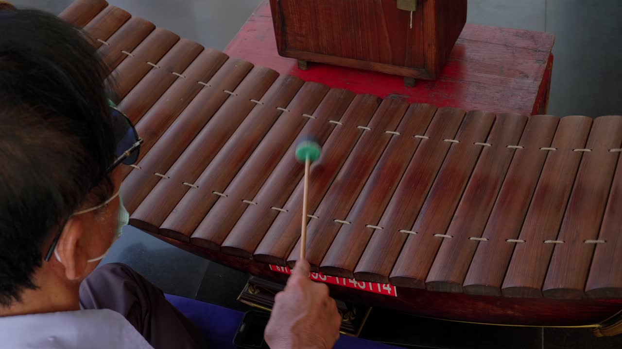 Over Shoulder View, Asian Man Playing Wooden Ranat Thai Xylophone Using ...