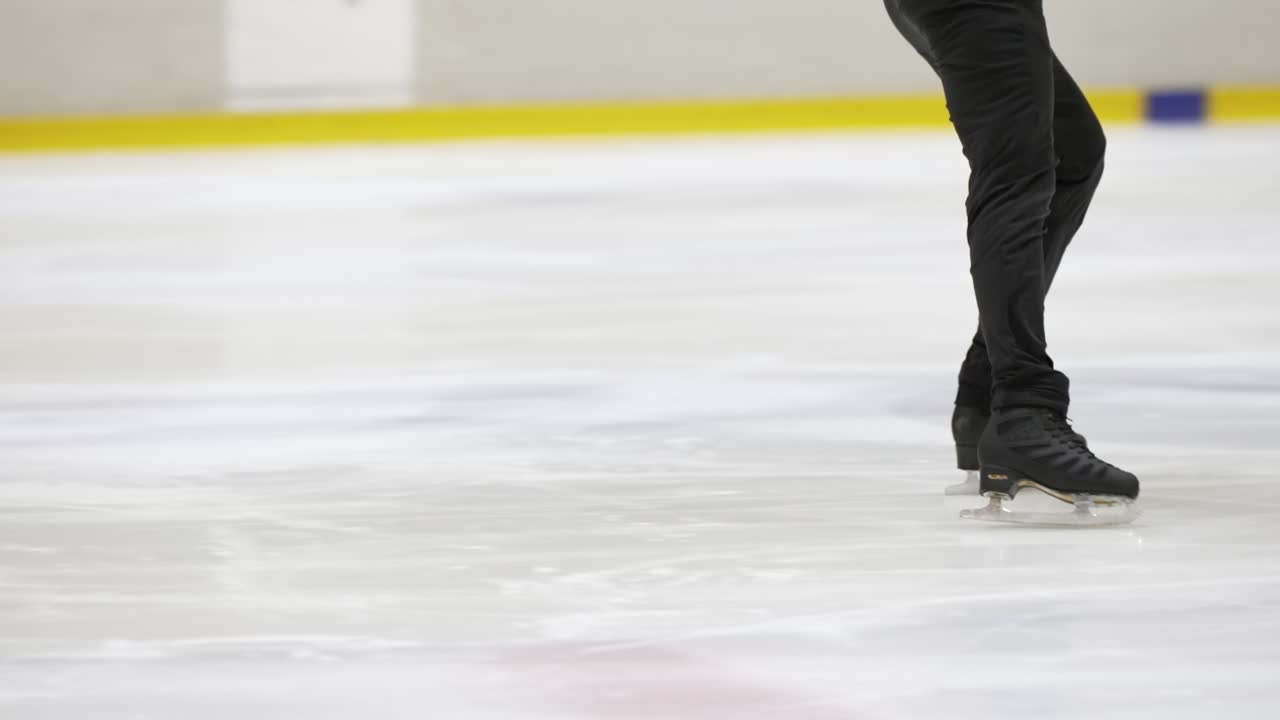 Male Ice Skater In Slow Motion Scene On Inside Ice At Rink Free Stock ...