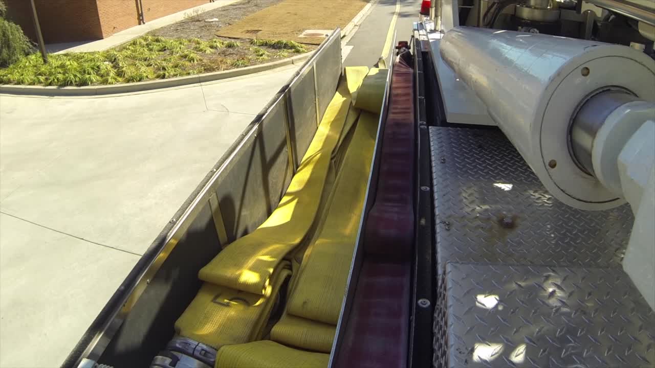 Fire Hose Drops Out Of A Fire Truck During A First Response Fire ...