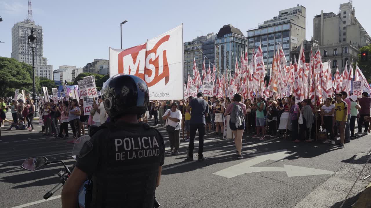 Police Is Watching A Peaceful Protest During Daytime In Buenos Aires ...