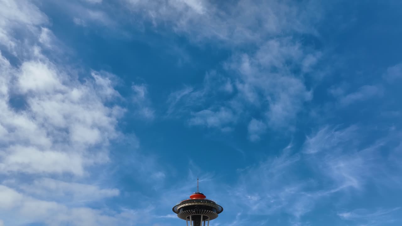 Epic Lowering Shot Revealing The Seattle Space Needle In A Sky Filled ...