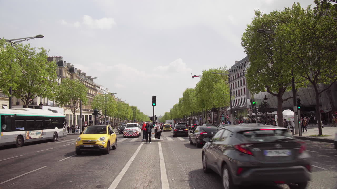 Heavy Traffic And Pedestrians In Paris Champs Elysees In Paris France ...